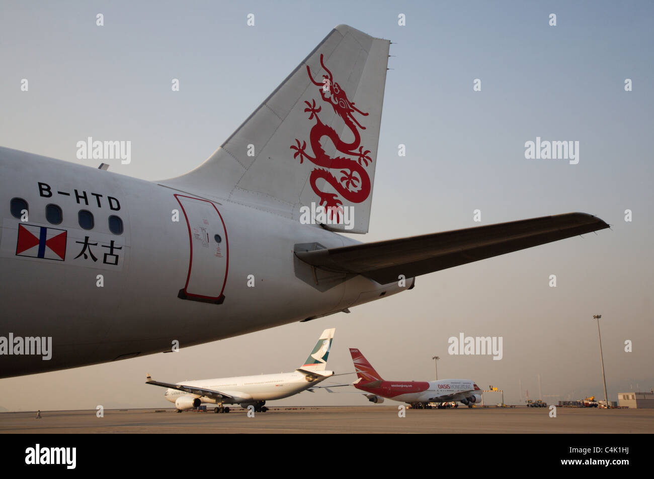 Dragonair plane livery tailfin tail logo Stock Photo - Alamy