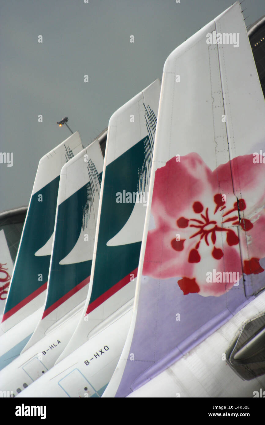 Cathay Pacific china airlines tailfins tails plane Stock Photo - Alamy