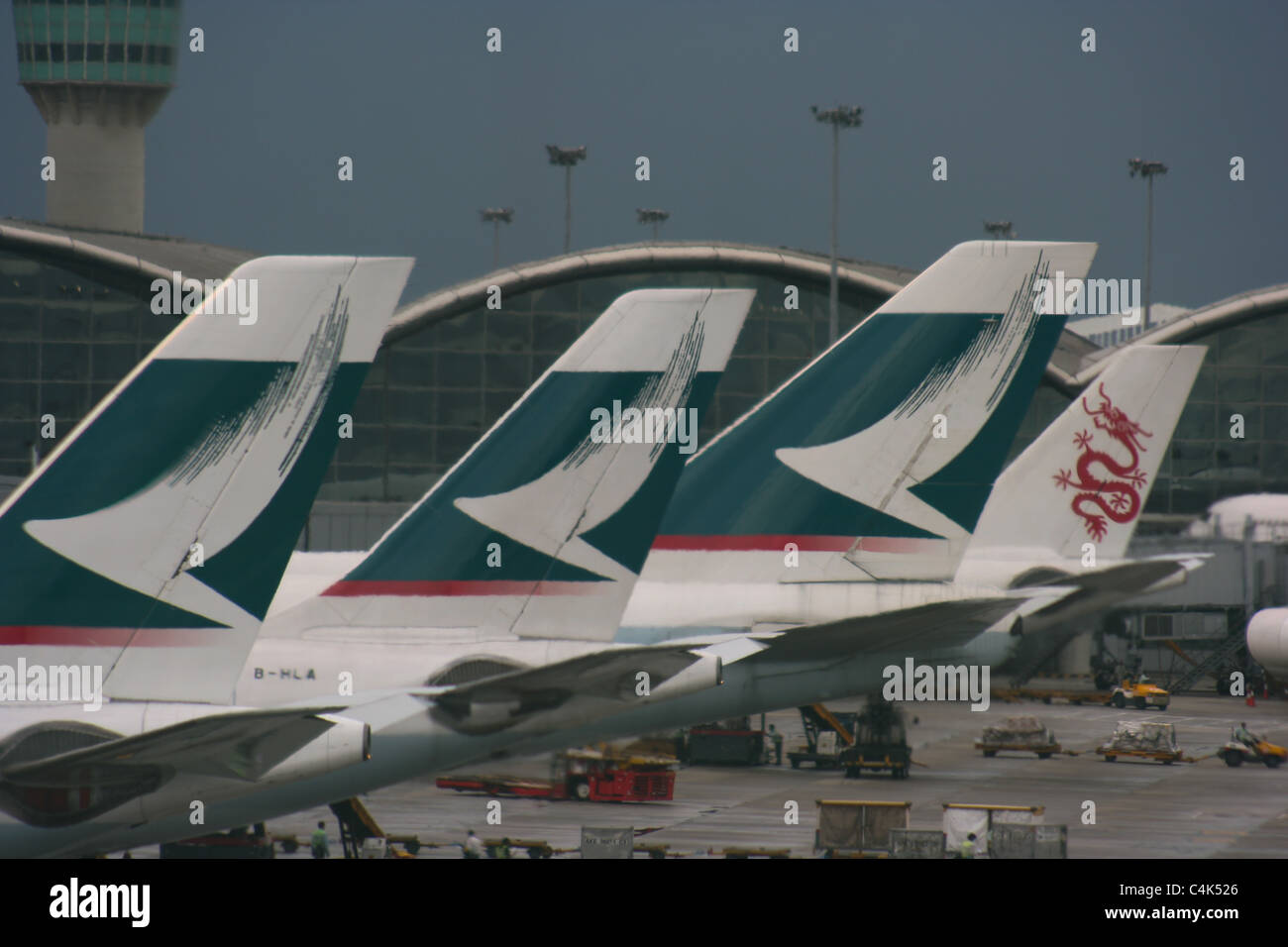 Cathay Pacific china airlines tailfins tails plane Stock Photo - Alamy