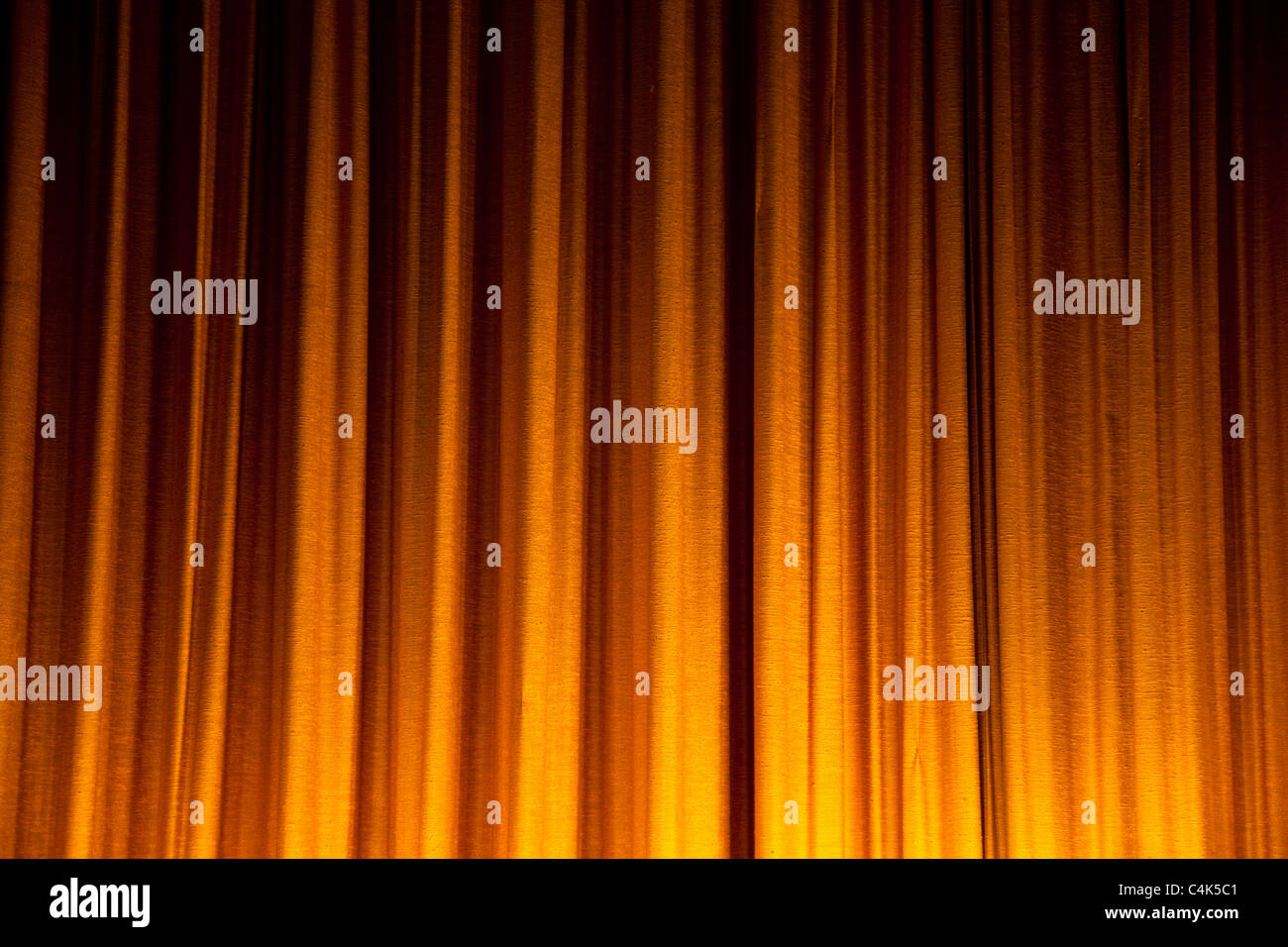 Yellow Stage Curtain for background Stock Photo - Alamy
