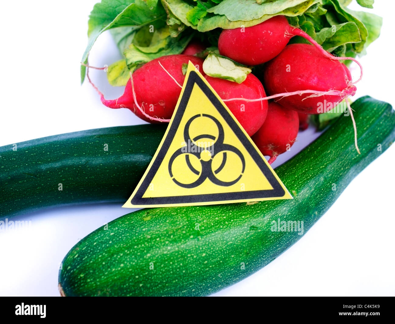 Vegetables with Biohazard sign as example for contaminated food Stock ...