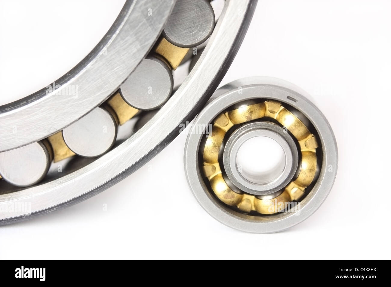 Two bearings, large and small, on a white background Stock Photo - Alamy