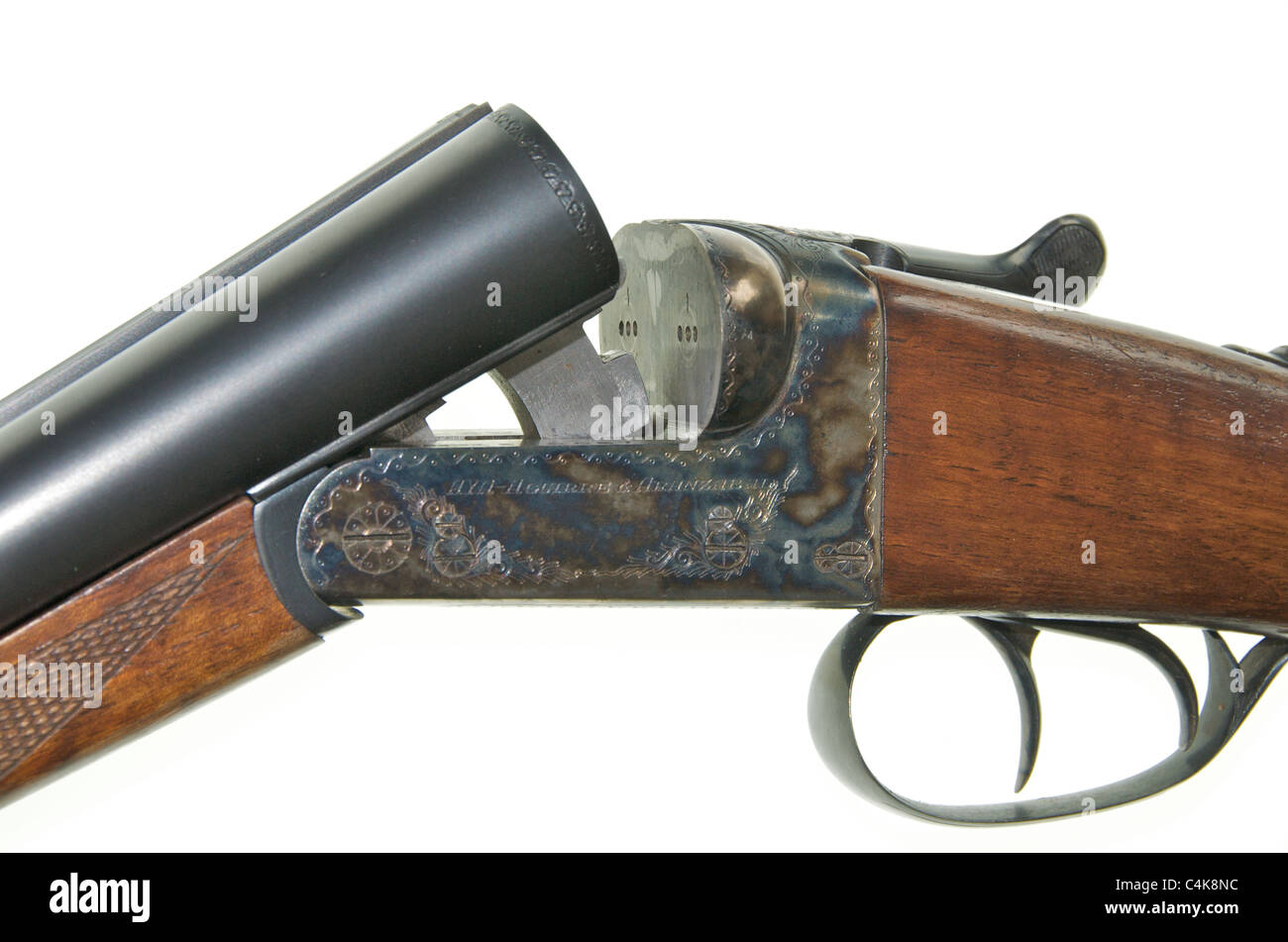 A 12 gauge bore shotgun. This is an AYA No 4 Boxlock side-by-side double barreled gun 'broken ...