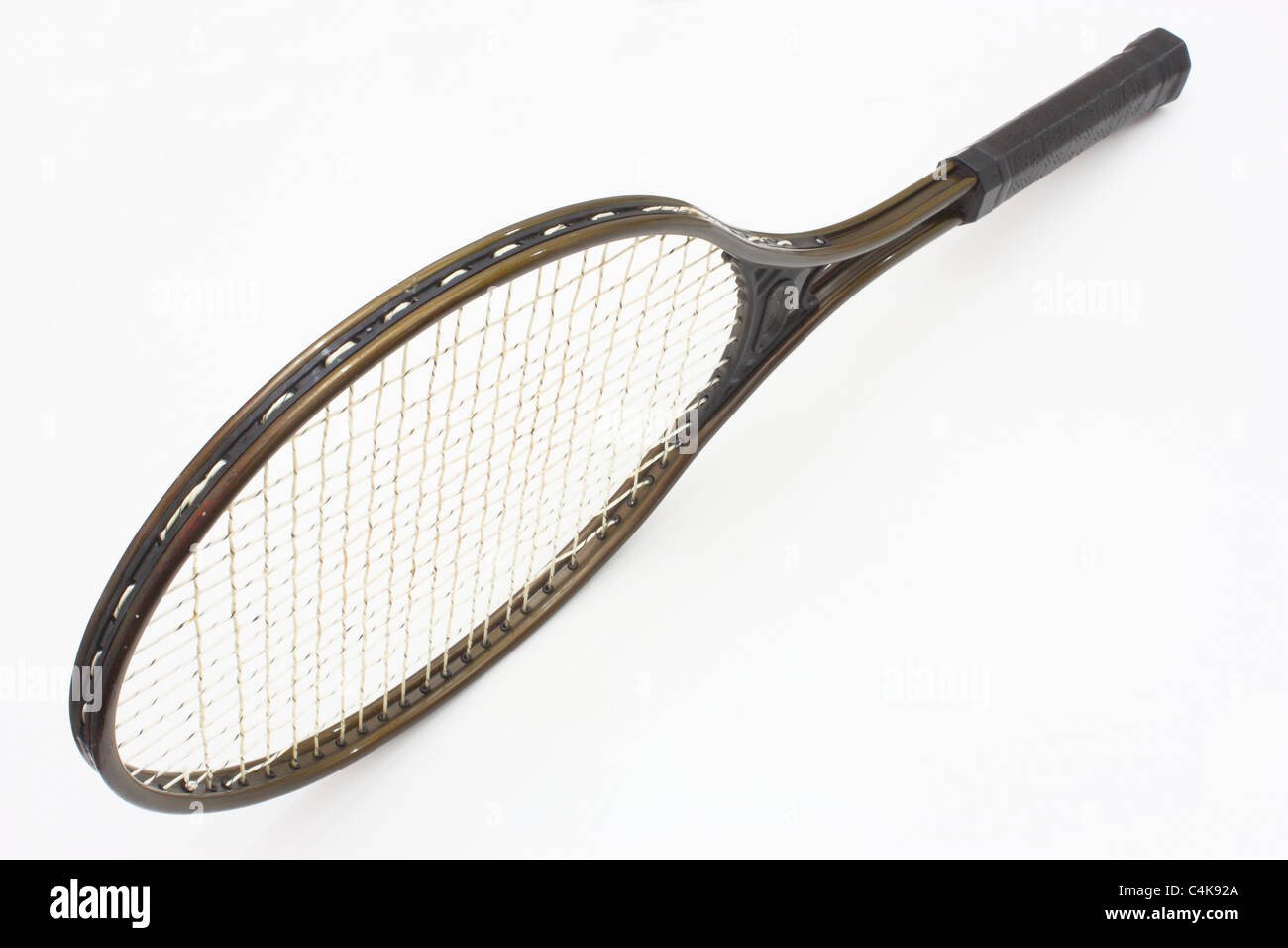 Tennis racket of brown color on a white background Stock Photo - Alamy