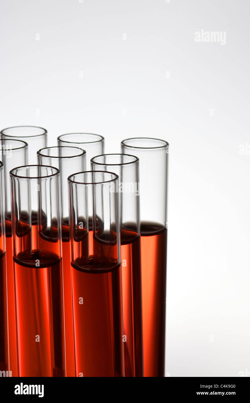 group of laboratory test tubes with red liquid inside Stock Photo - Alamy