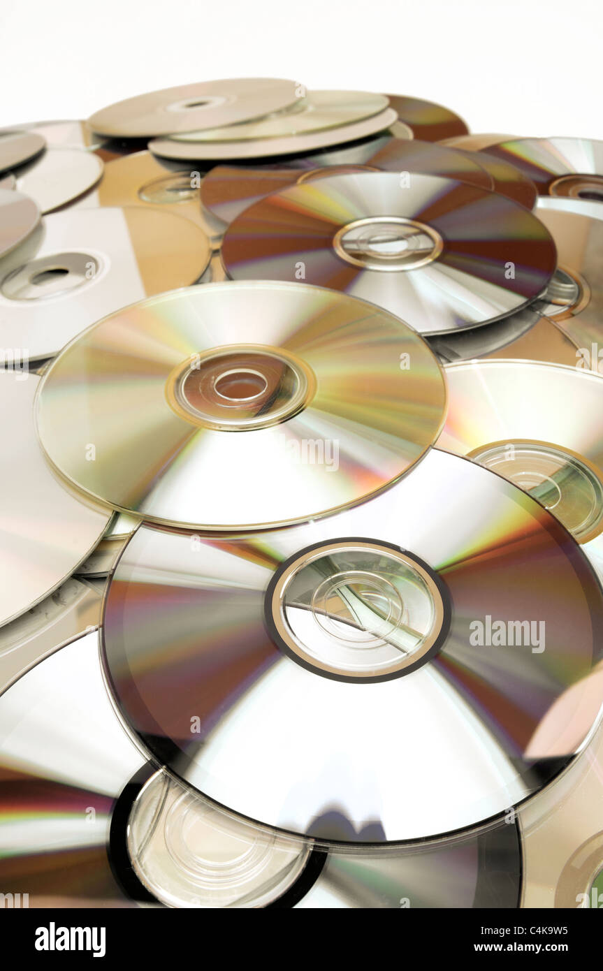 Given a set of DVDs scattered on a table Stock Photo - Alamy
