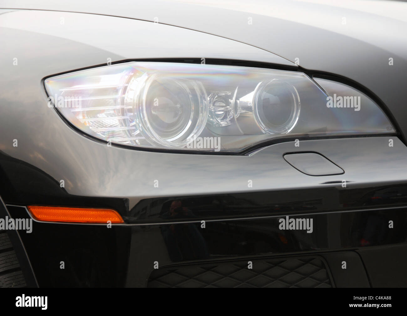 Closeup of car headlight - front view Stock Photo - Alamy