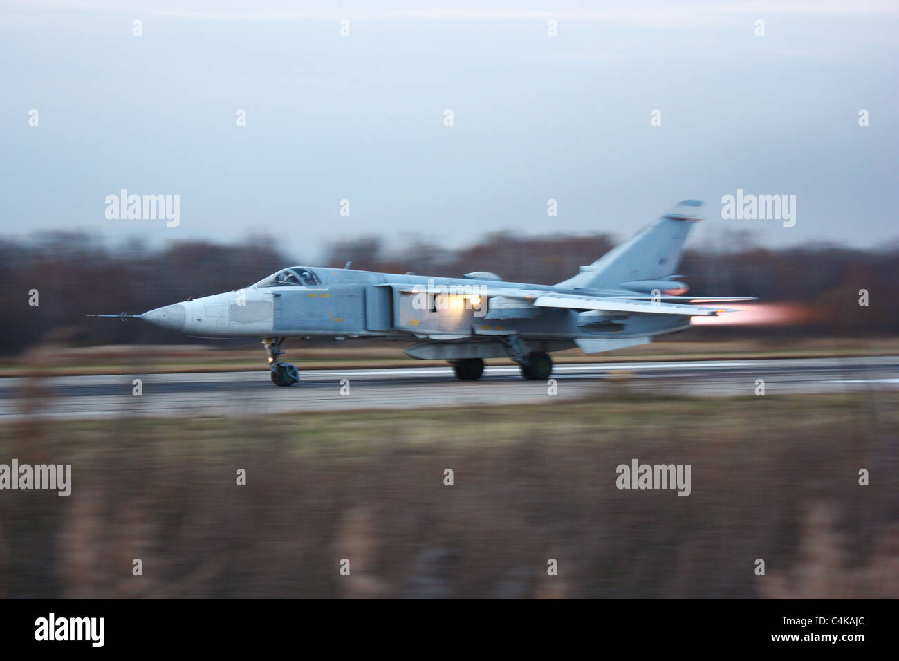 Military jet bomber on launch Stock Photo - Alamy