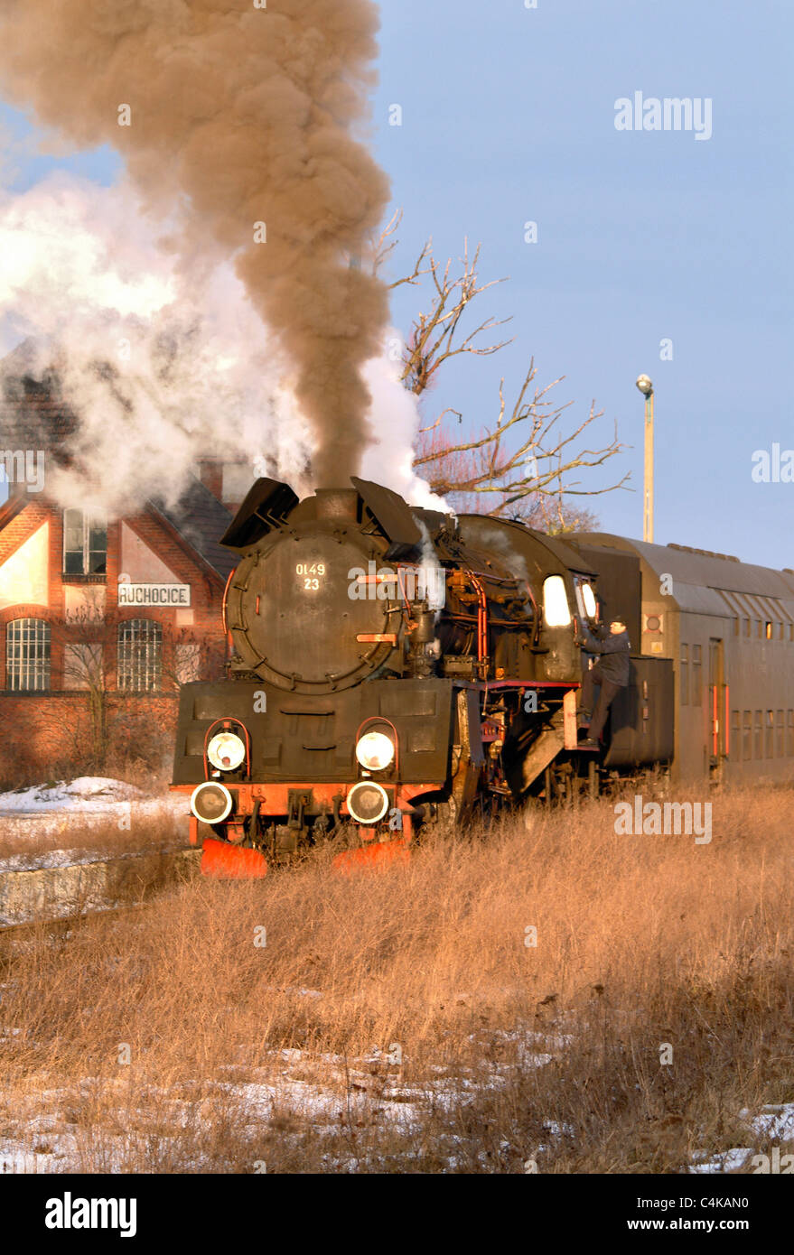 Colorful winter image of steam loco pulling out of Polish station Stock ...