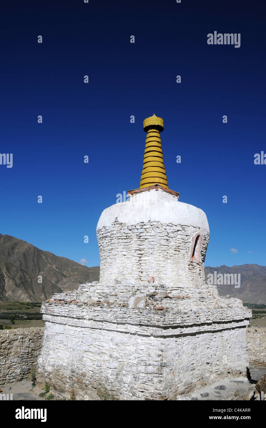 Landscape of a typical historic Buddhist stupa against blue sky in ...