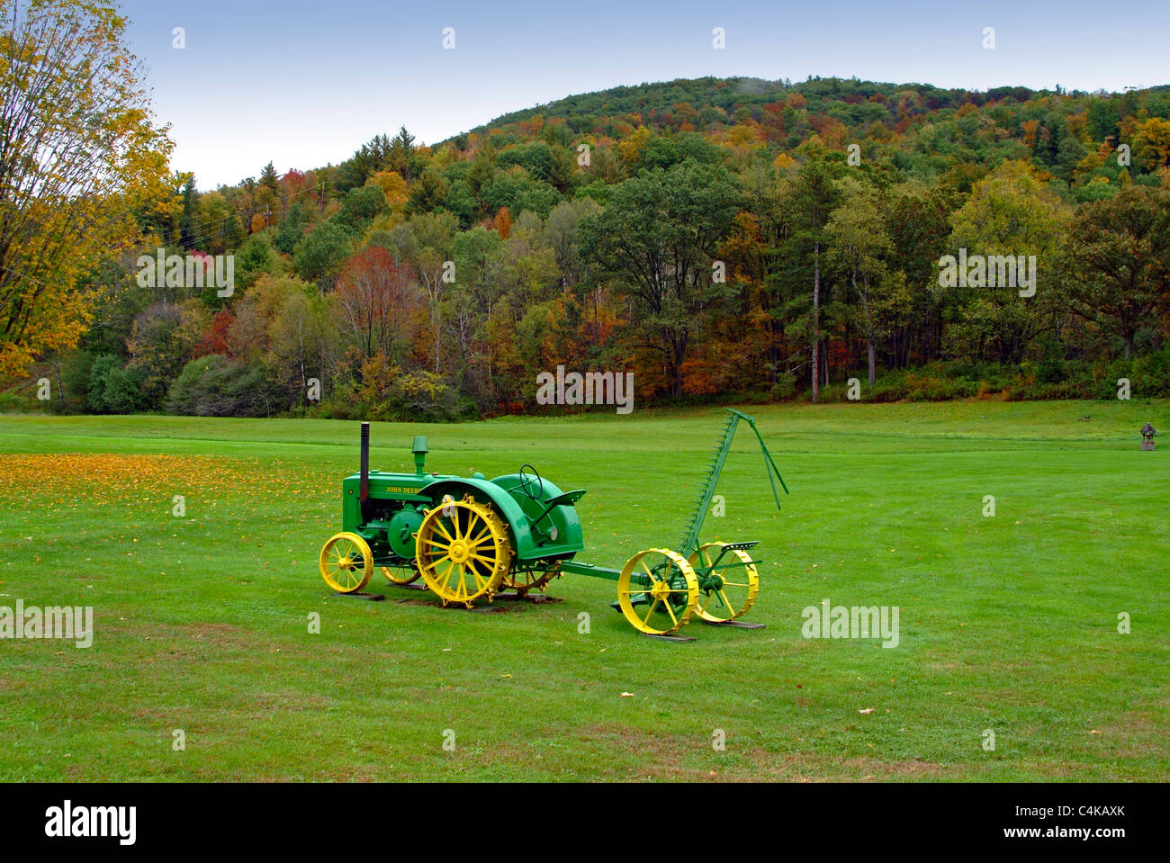 Old Massey Ferguson tractor standing in colorful New England field ...