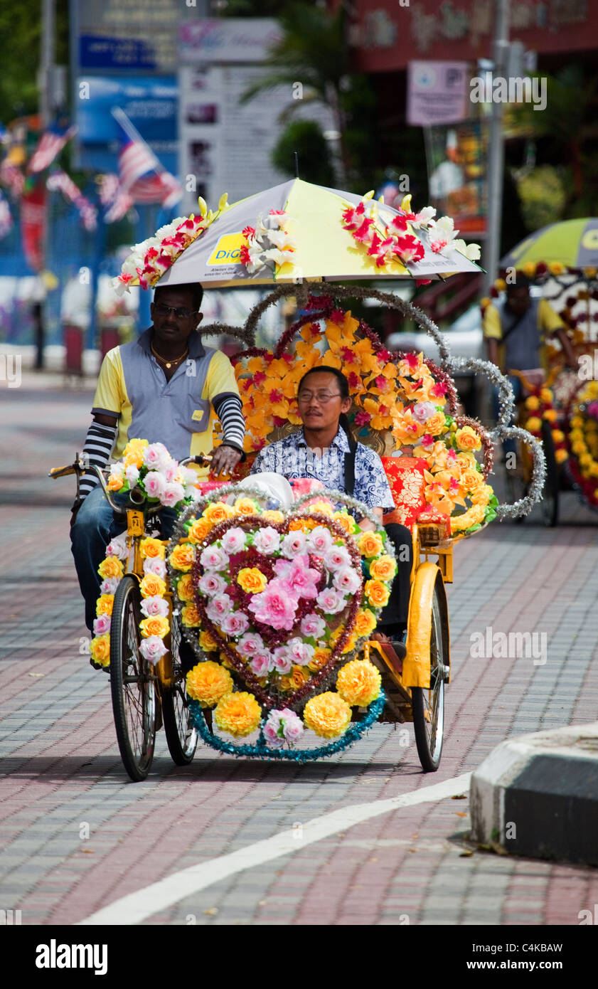 A Rickshaw Ride in Melaka, Malaysia Stock Photo - Alamy