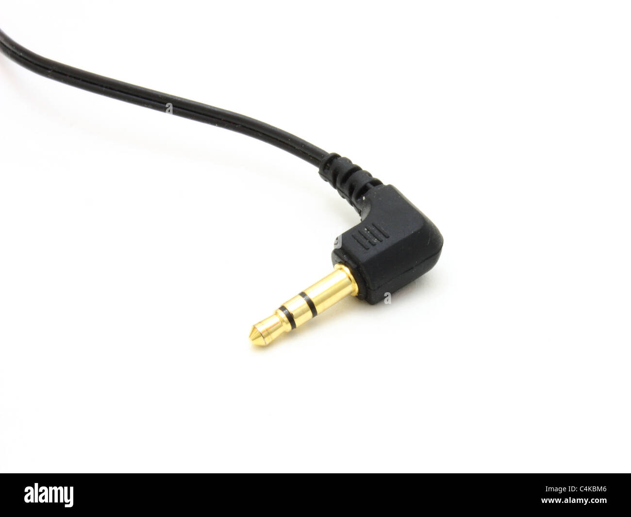 Small ear-phones and the tip for connection on a white background Stock ...
