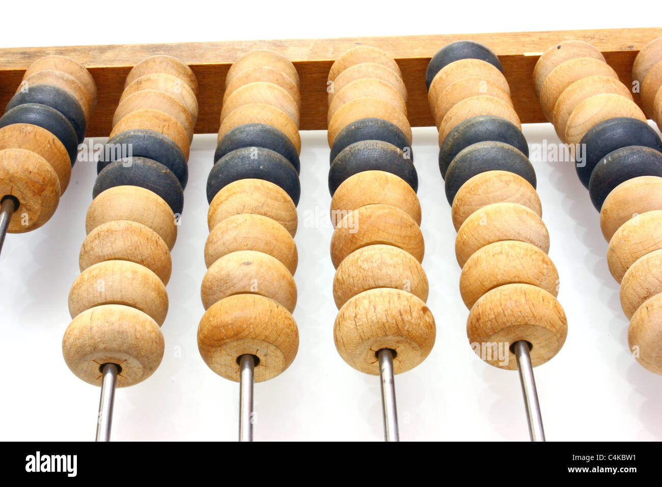 Accounting abacus for financial calculations lies on a white background ...