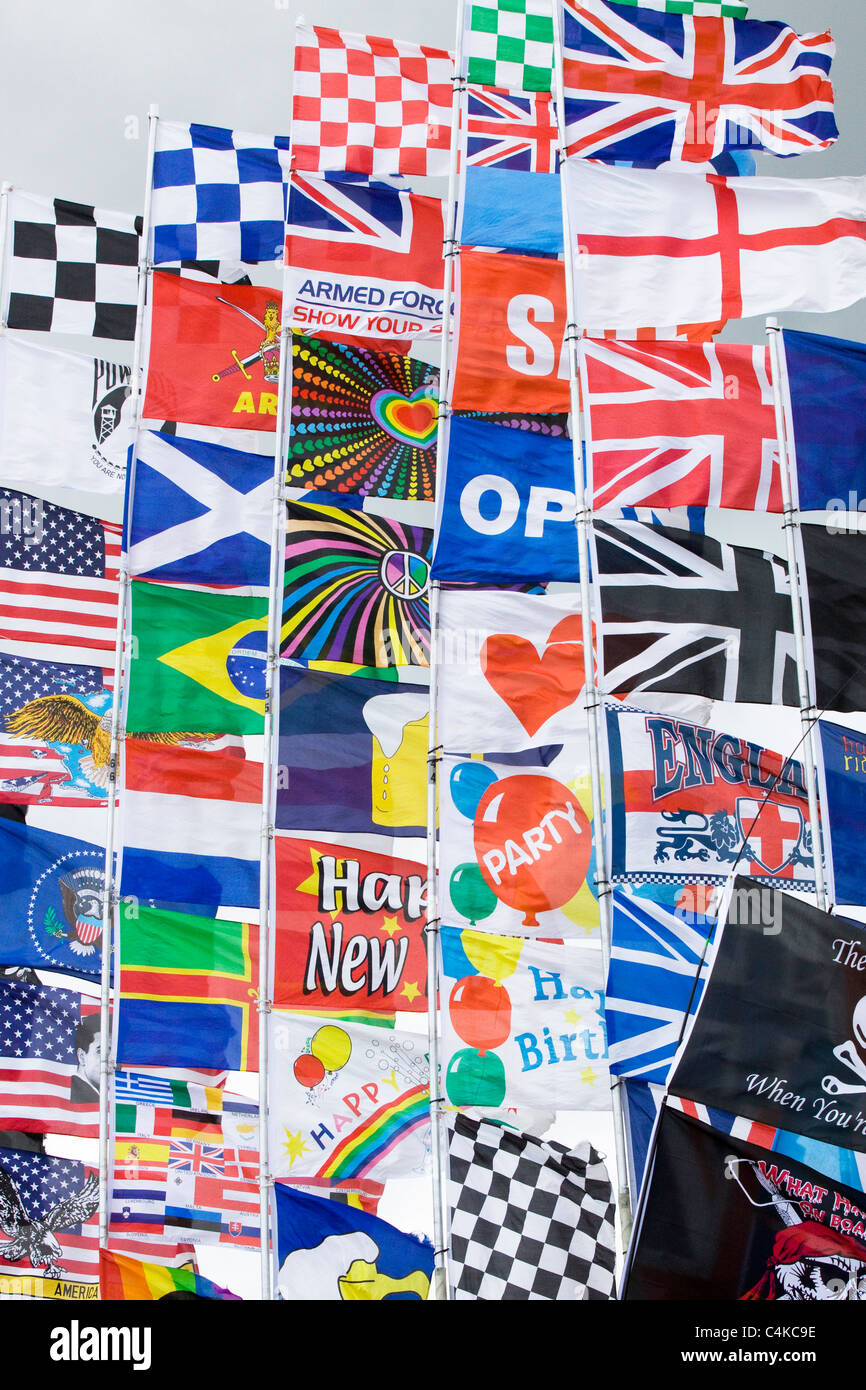 Assorted flags flying at a show ground in England Stock Photo - Alamy