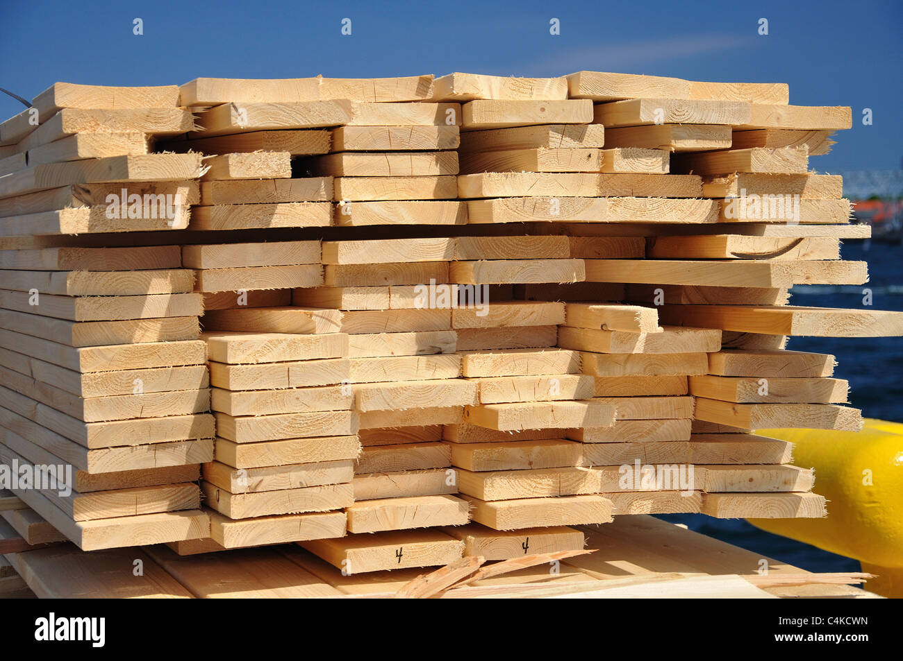 Stack of timber planks by harbour, Copenhagen (Kobenhavn), Kingdom of ...