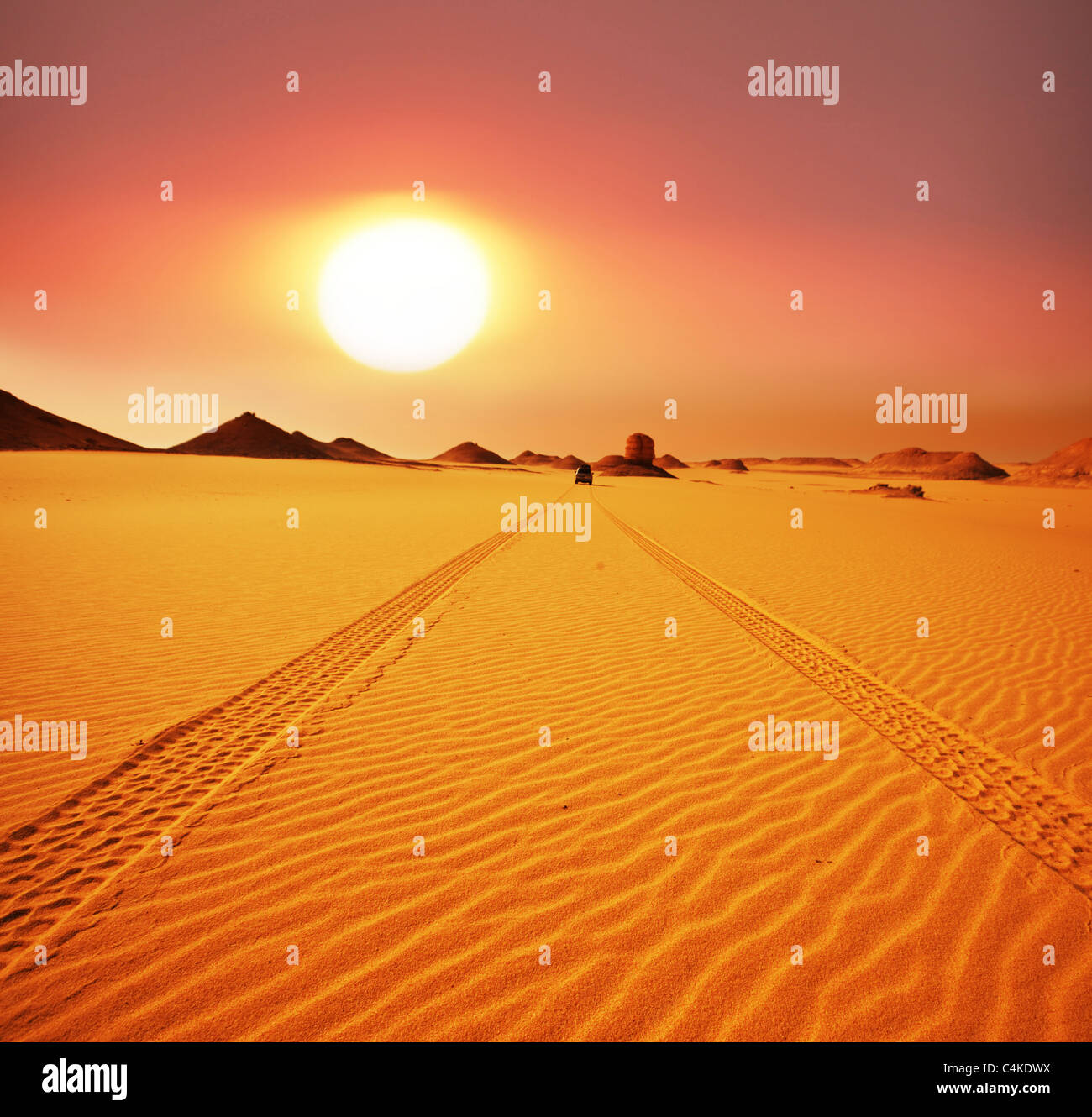 Desert at sunset Stock Photo - Alamy