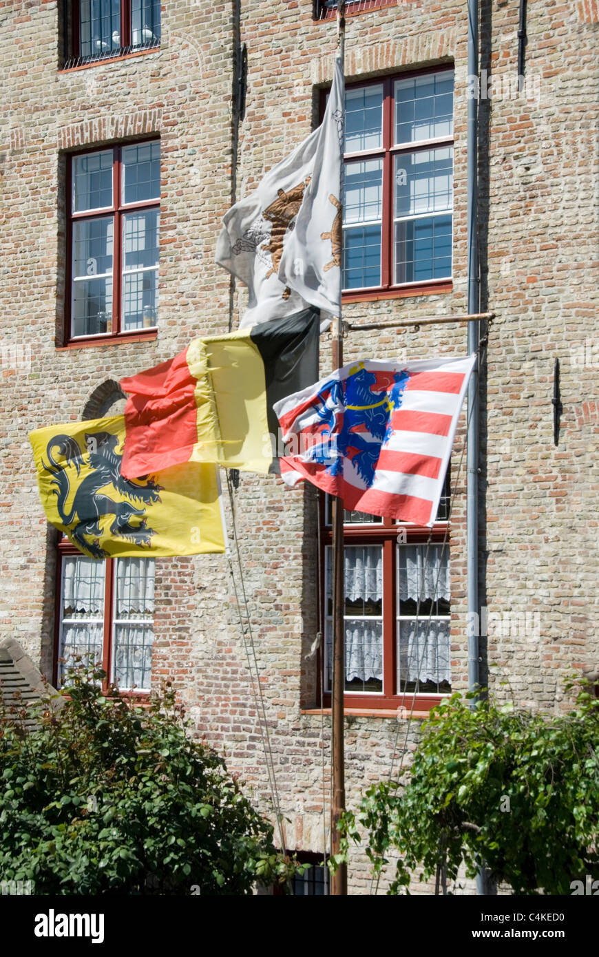 BELGIUM; BRUGES; FLAGS OF THE TOWN INCLUDING BELGIAN NATIONAL FLAG ...