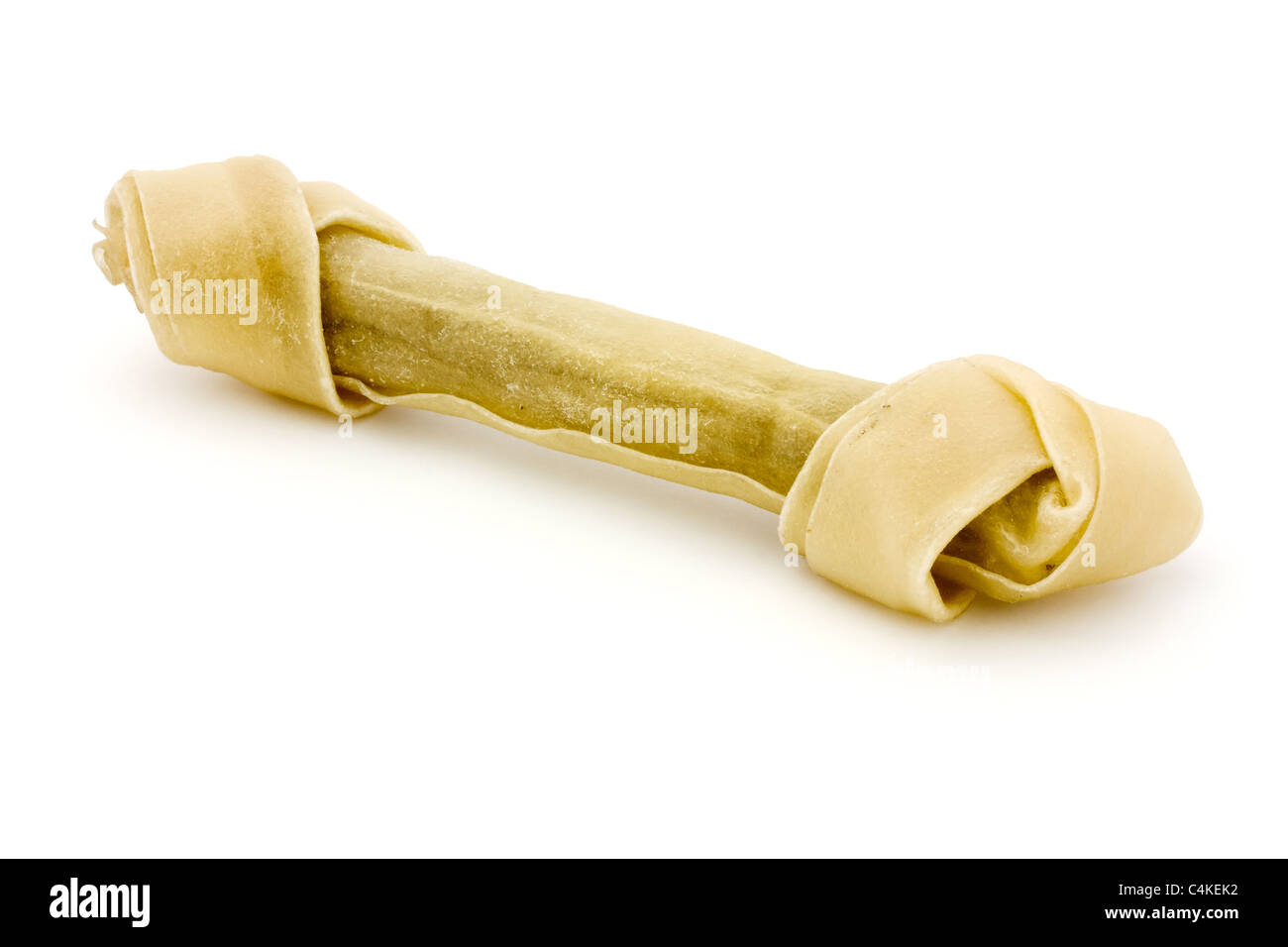 Dog bone isolated on white Stock Photo - Alamy