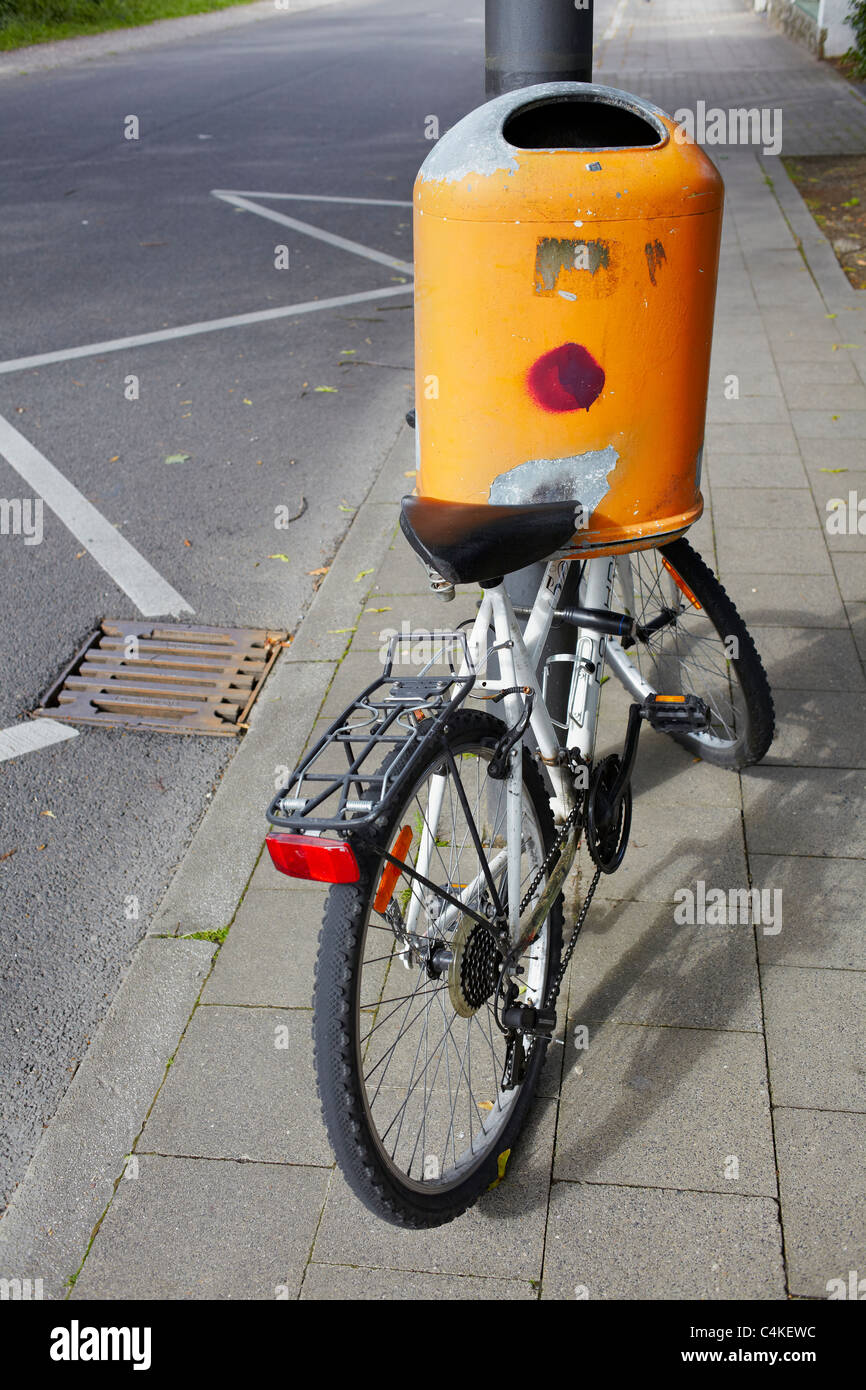 Bicycle crash with a trash container Stock Photo - Alamy
