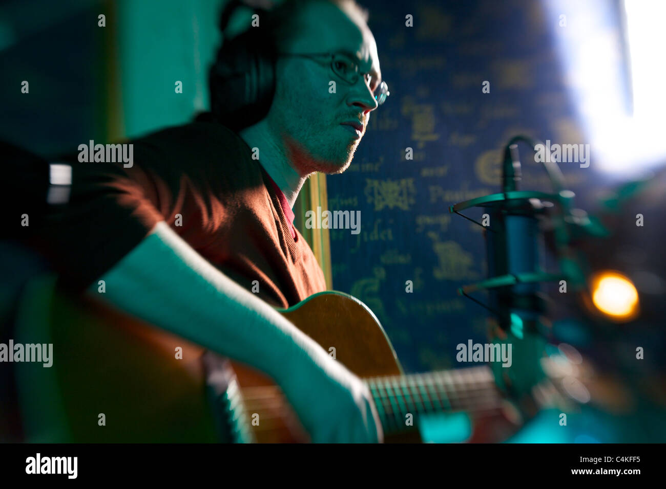 Lead guitarist Johnny Heyes, recording some tracks in a studio in ...