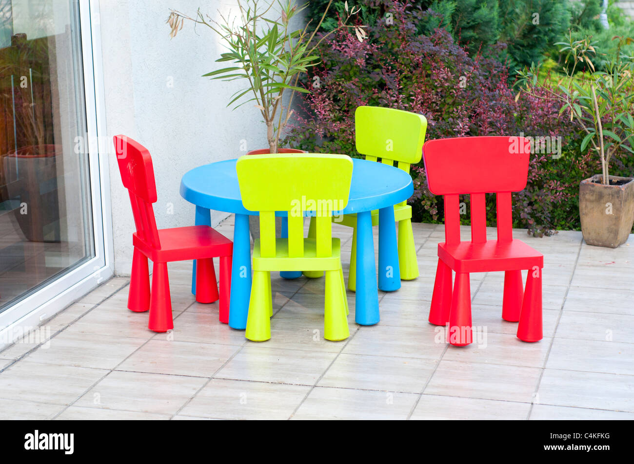 Children's chairs on the terrace Stock Photo - Alamy