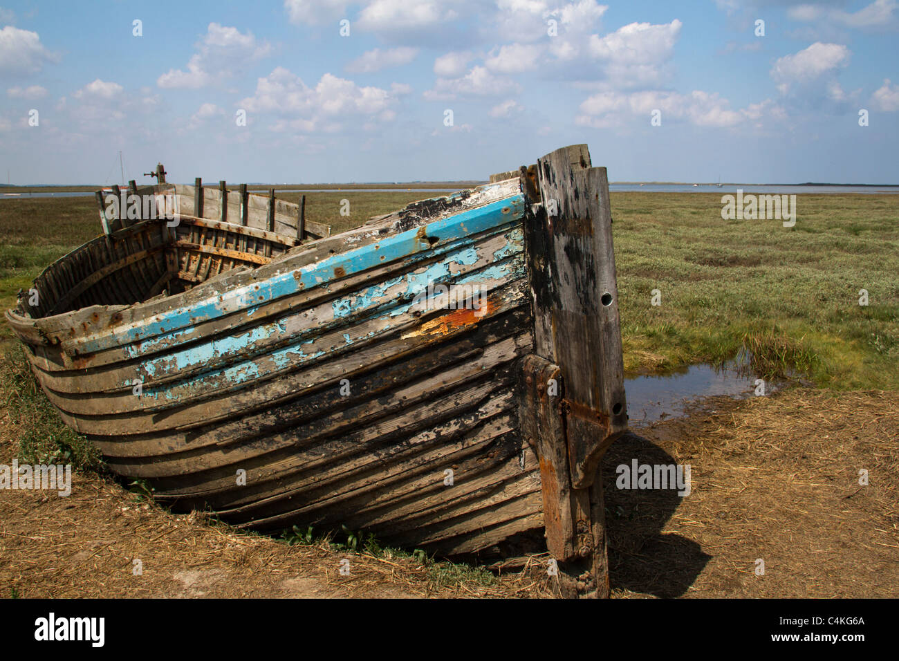 Colourful Old abandoned rotting wooden boat Stock Photo - Alamy
