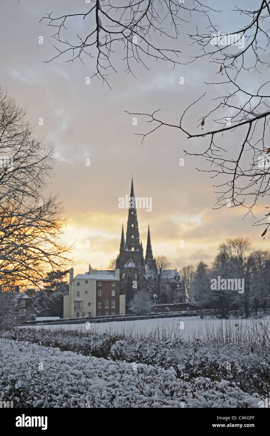 Lichfield Cathedral in winter snow seen from Stowe Fields with sunset ...