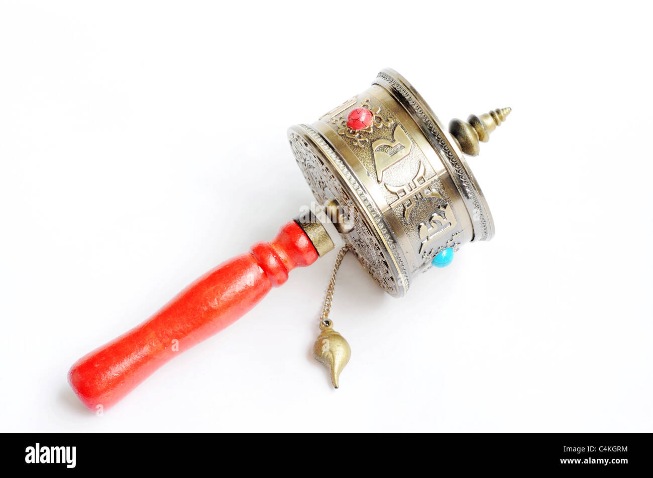 A Tibetan prayer wheel isolated on white background,used as a buddhist ...