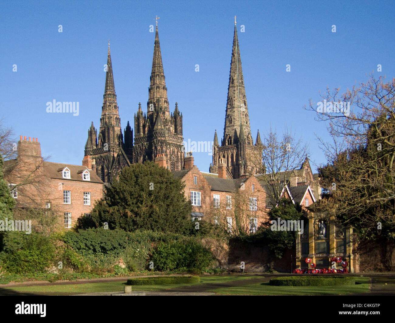 Three spires of Lichfield Cathedral with Memorial Gardens in the ...