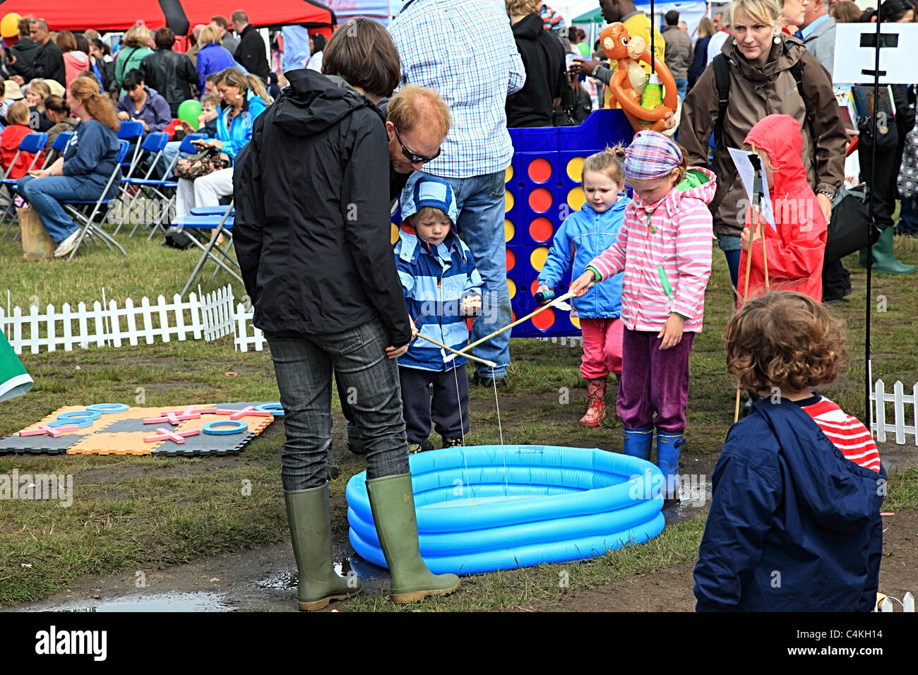 Children playing at Wimbledon village Fair on Wimbledon Green in ...