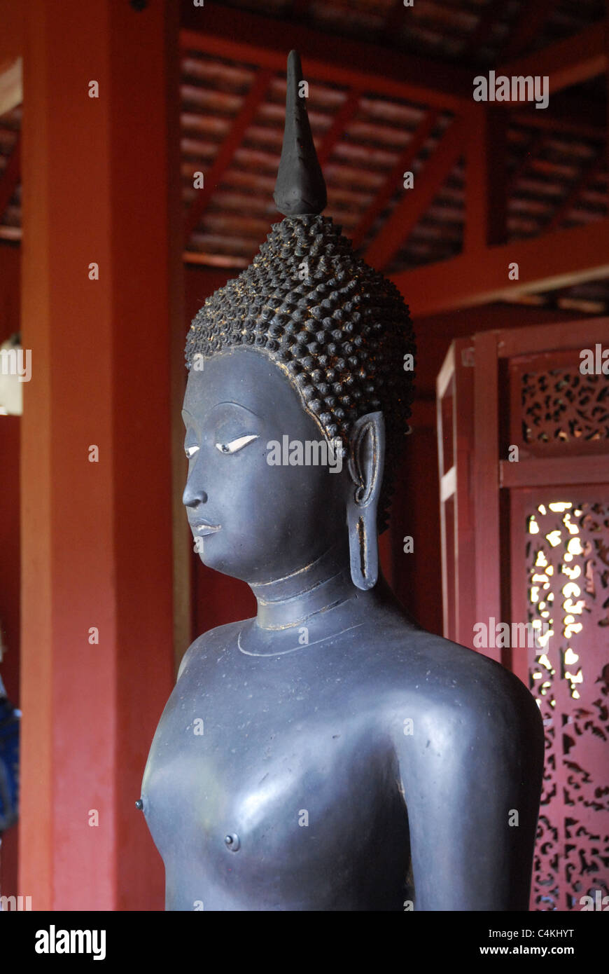 Buddha inside a decorative Bridge over a large pond, The Garden of the ...