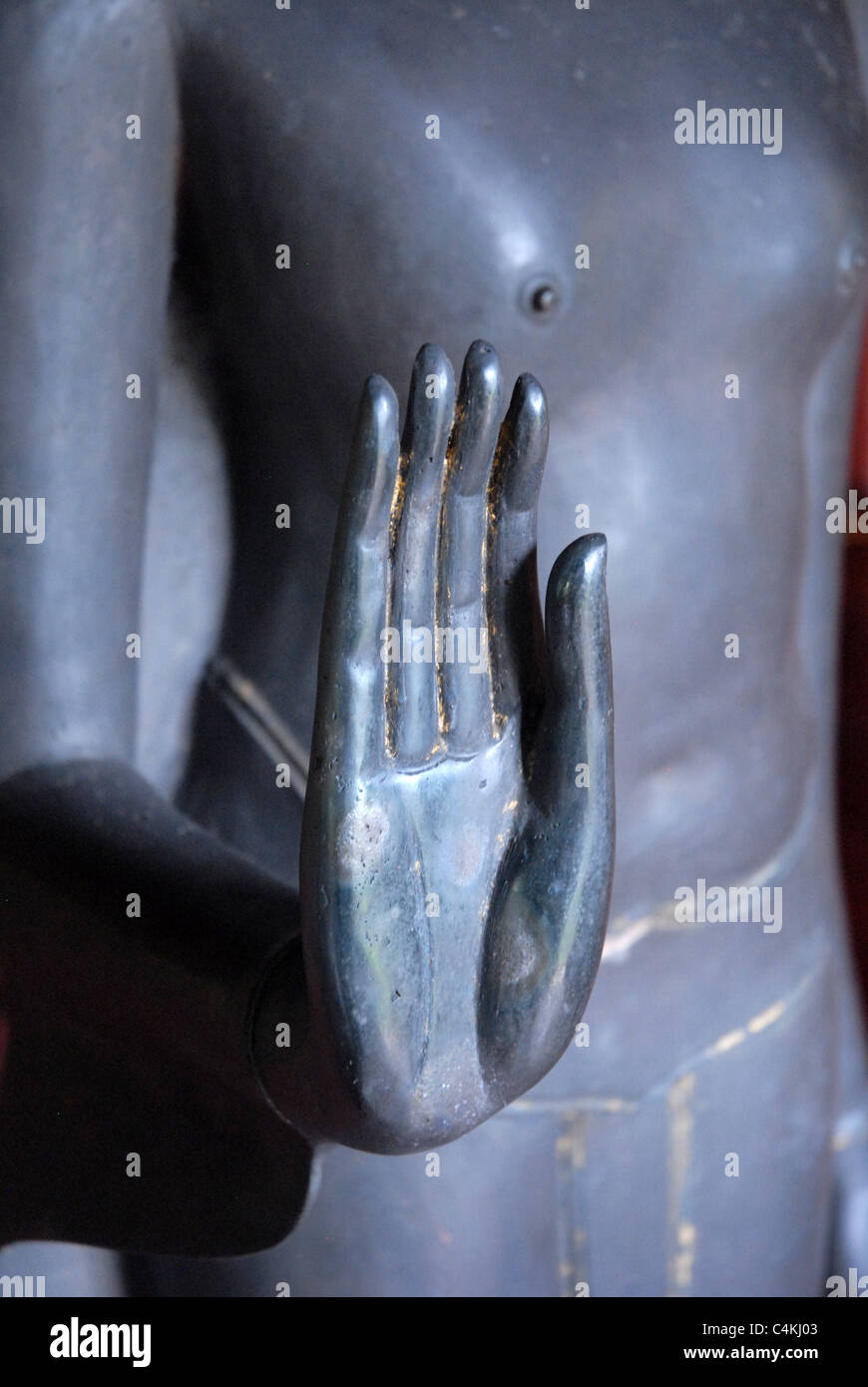 Buddha inside a decorative Bridge over a large pond, The Garden of the ...