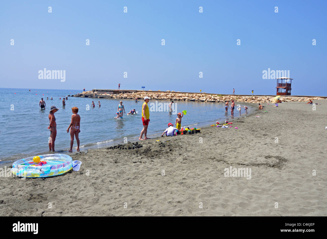 Tourists on beach in Limassol southern Cyprus Stock Photo - Alamy