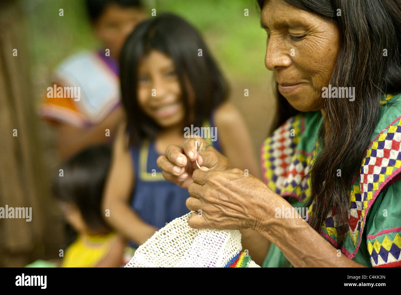 Indigenous Ngobe Bugle old woman sewing. Chiriqui. Panama Stock Photo ...