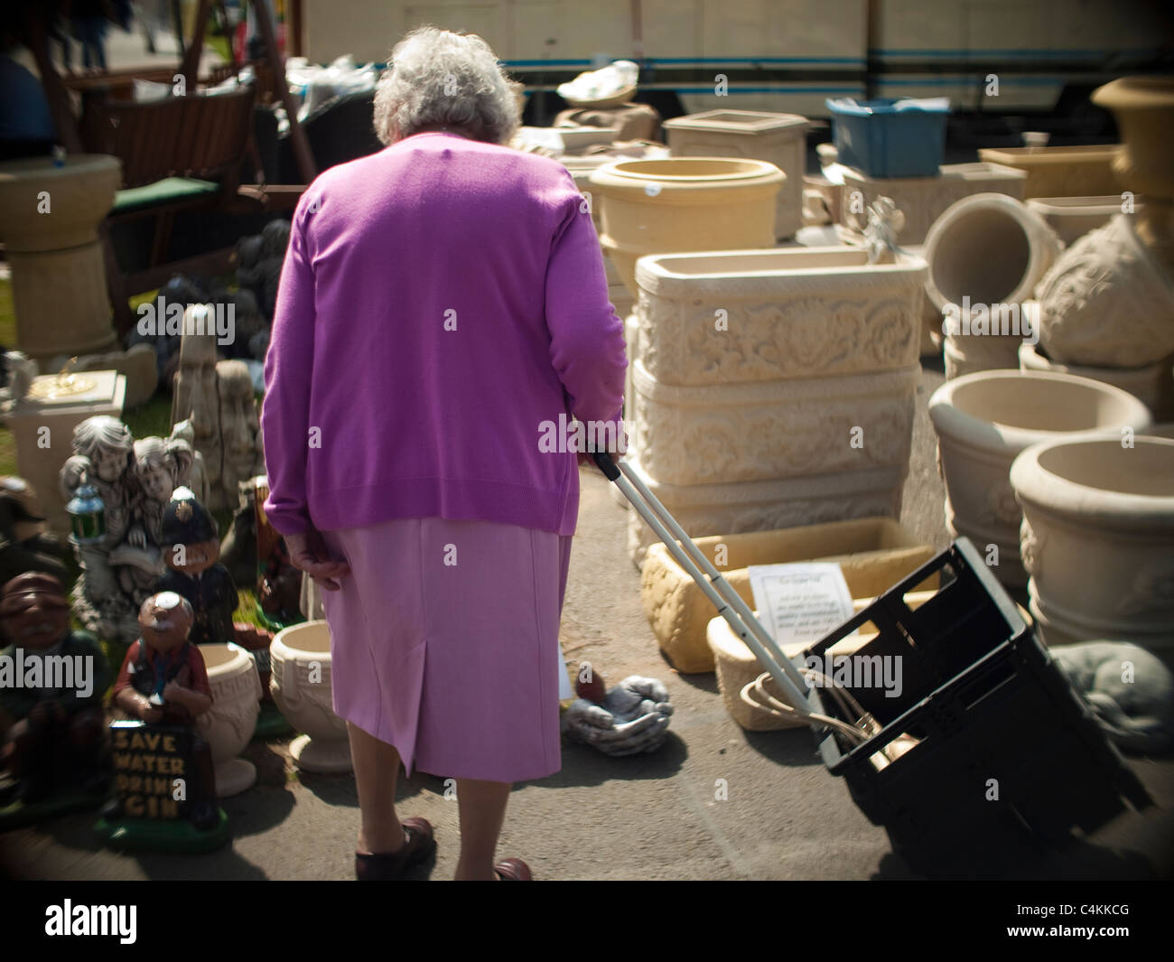 Old lady shopping trolley hi-res stock photography and images - Alamy