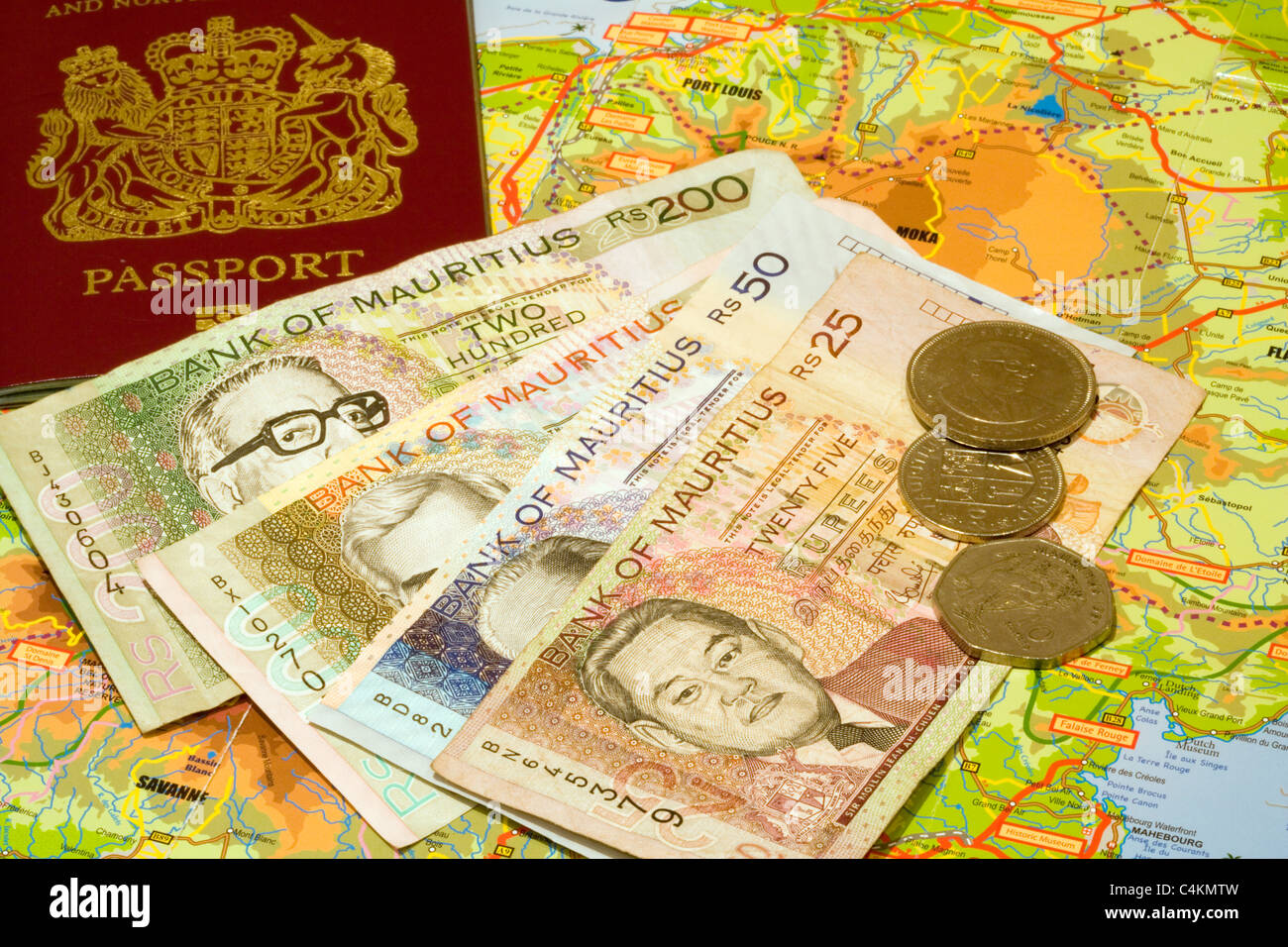 Mauritian Currency Bank notes and coins UK Passport on map of Mauritius ...