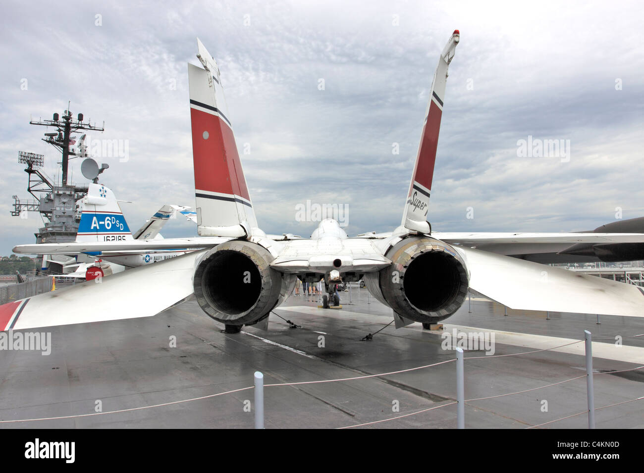 Rear view of Grumman F-14 Tomcat Navy fighter jet on flight deck of the ...
