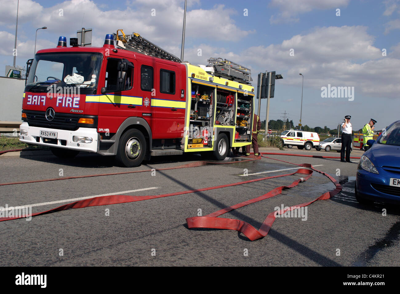 Typical London fire engine at the scene of a large fire Stock Photo - Alamy