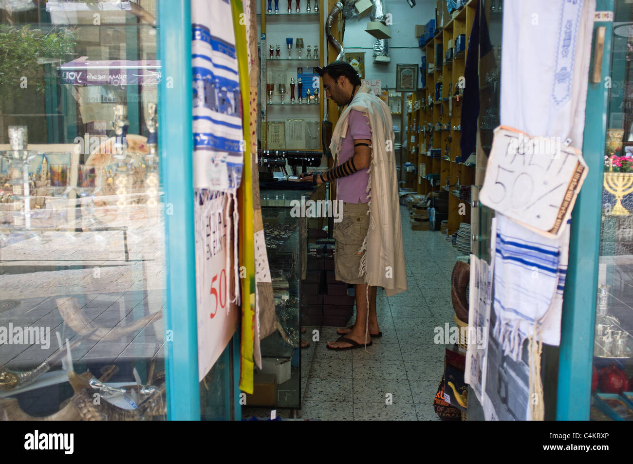 Jewish male shopkeeper in Judaica shop on Ben-Yehuda Street in ...