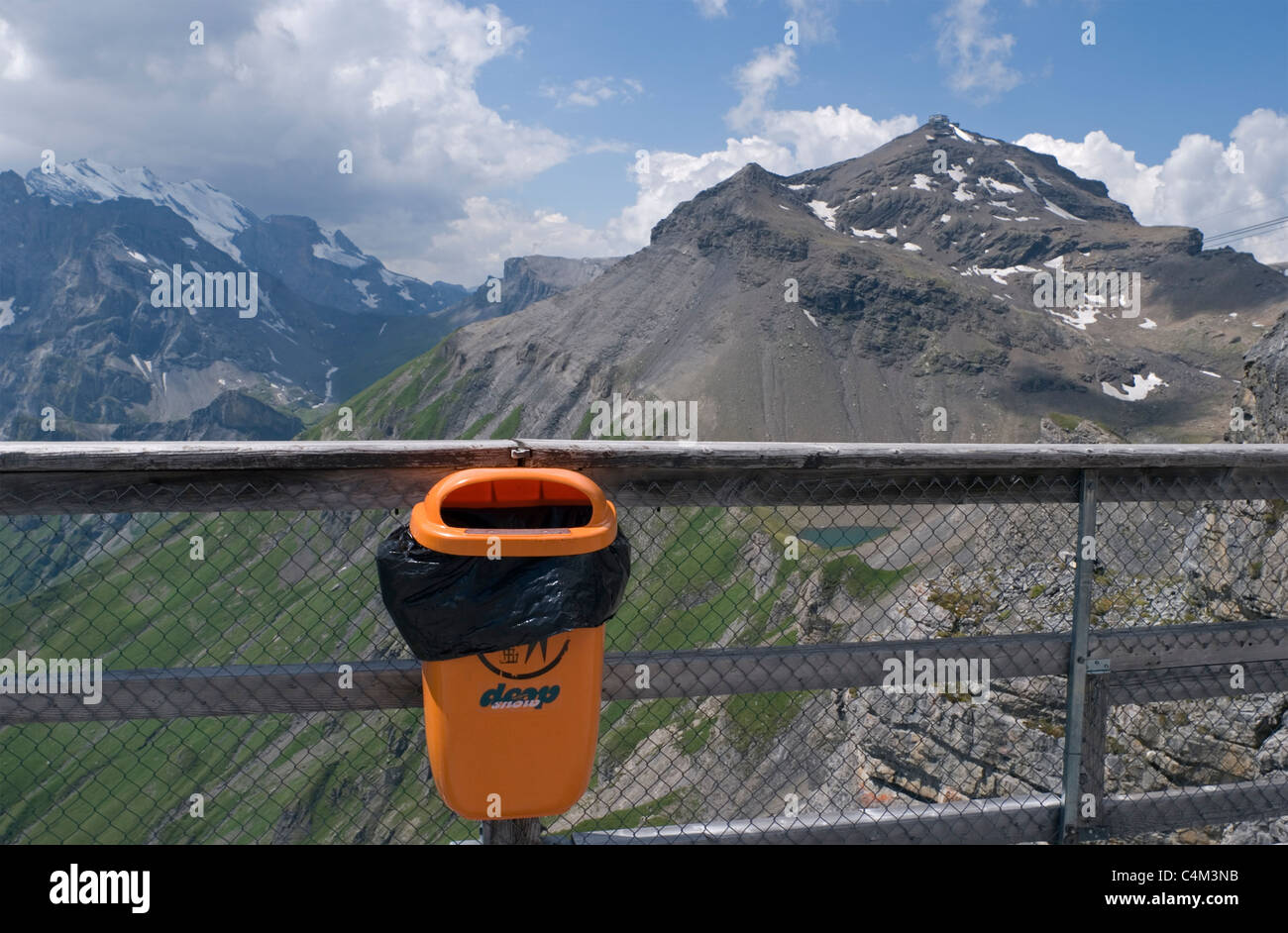 garbage bin and Schilthorn Mountain - Swiss Alps - Oberland ...