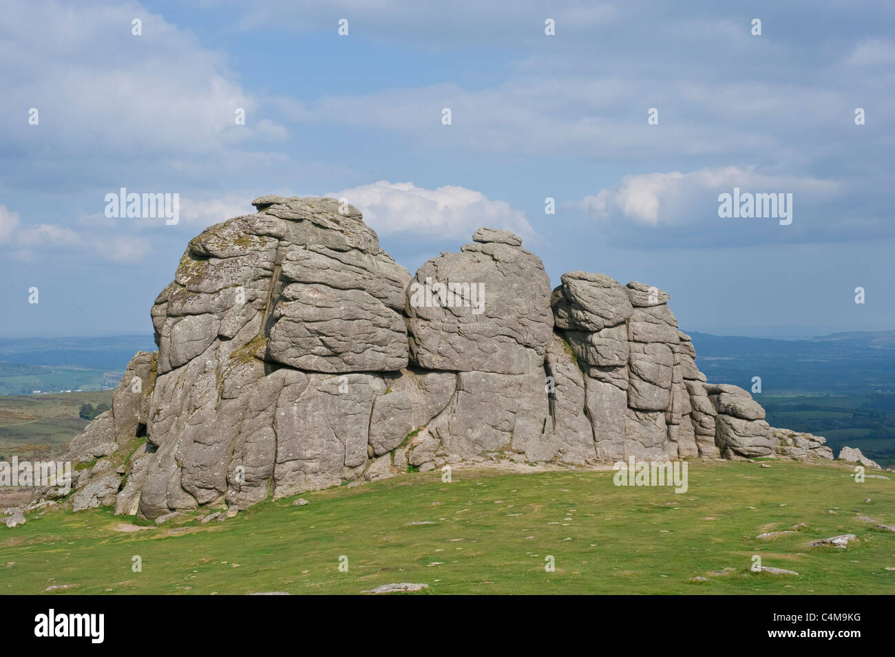A view of Haytor rocks in Dartmoor National Park with bright sunshine ...