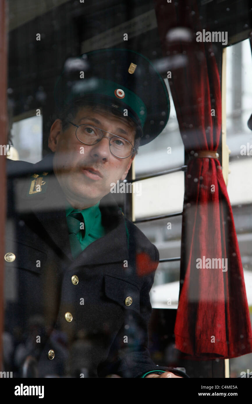 A uniformed driver in a revived historic tram line in Berlin Germany ...