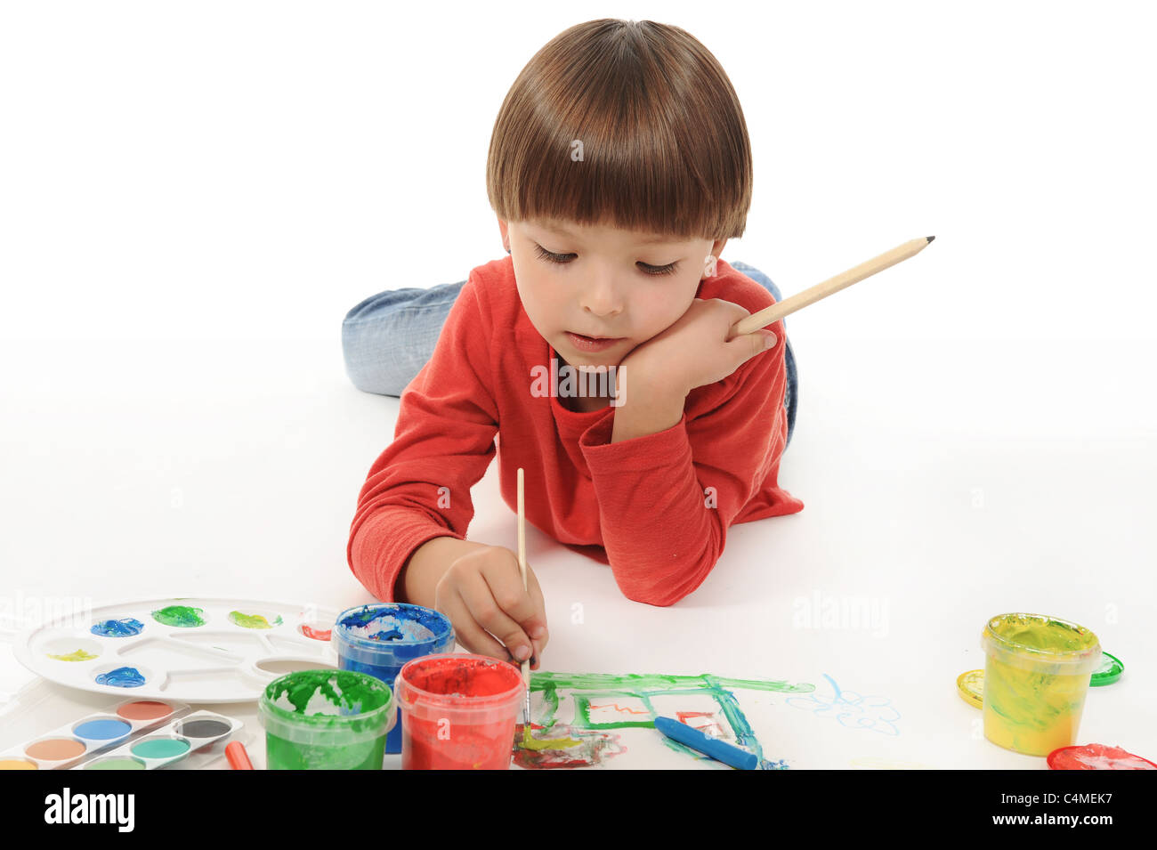 little boy paints Stock Photo - Alamy