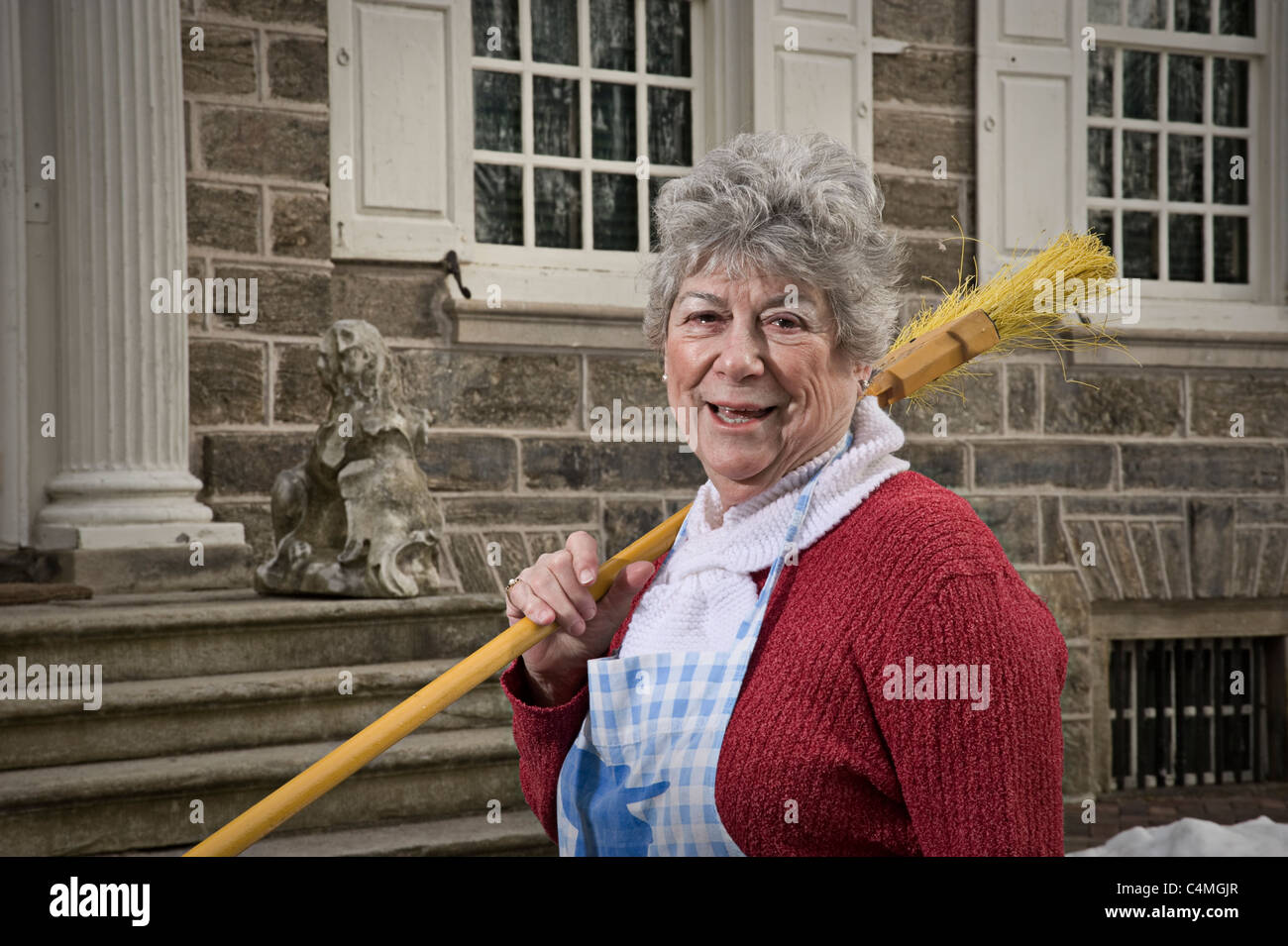 Elderly woman sweeping outside old hi-res stock photography and images ...