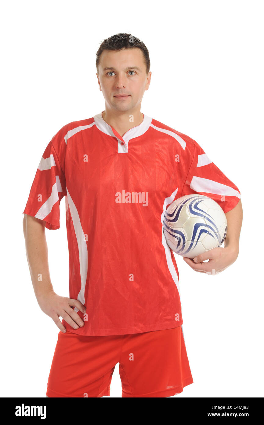 Healthy boy kicking football image hi-res stock photography and images ...