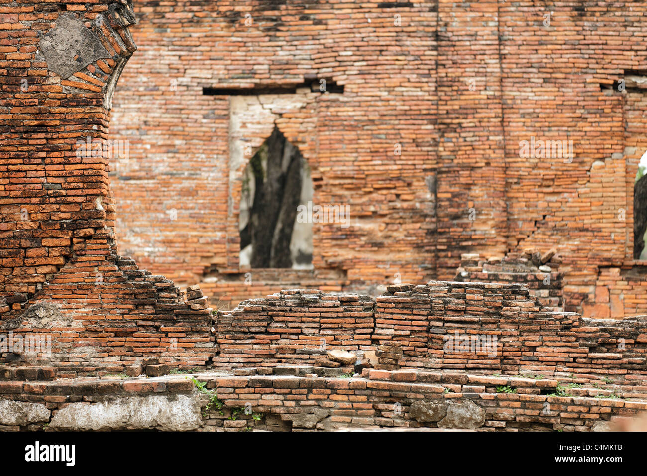 ancient brick wall at Wat Phra Ram khmer temple in ayutthaya, thailand ...