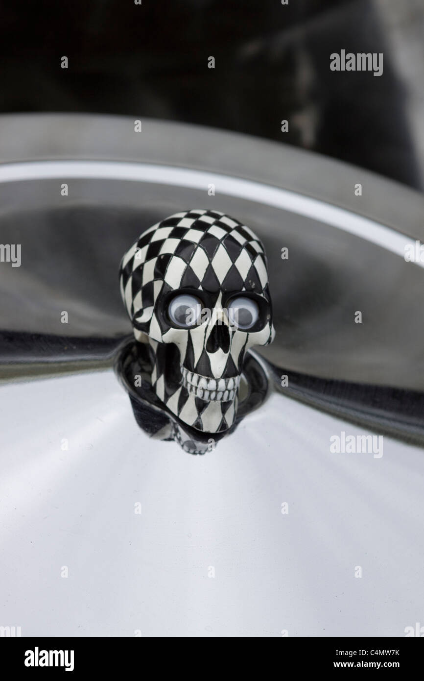 A Checkered Skull on the bonnet of a hotrod Stock Photo - Alamy