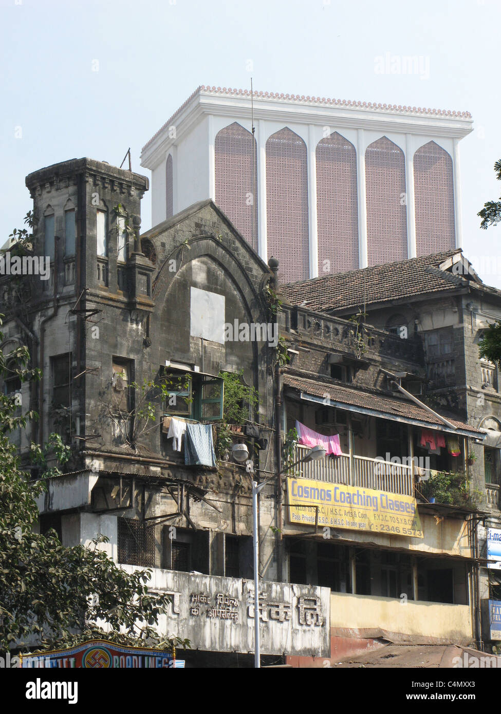India. Raj old colonial architecture with modern luxury building in ...
