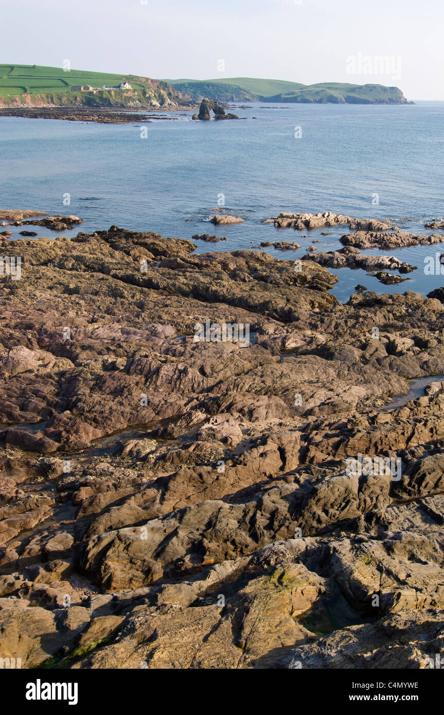 Vertical view of Thurlestone Rock, or "thirled stone", an arch-shaped ...